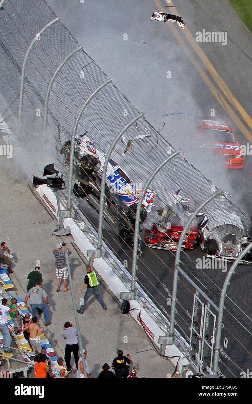 A horrific wreck of NASCAR driver Kyle Larson occurs with debris flying ...
