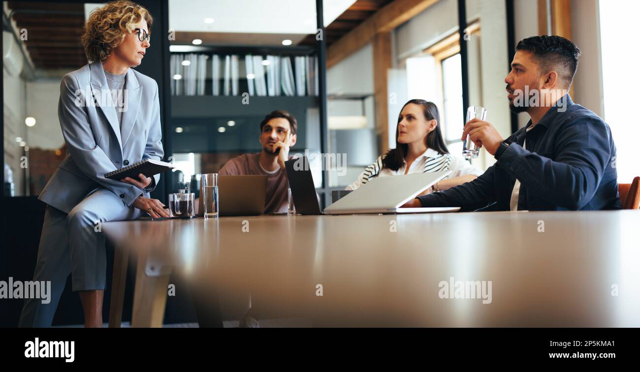 Team professional business people discussing hi-res stock photography ...