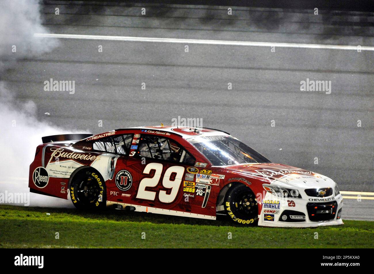 Kevin Harvick (29) celebrates his win with a burnout during the NASCAR ...