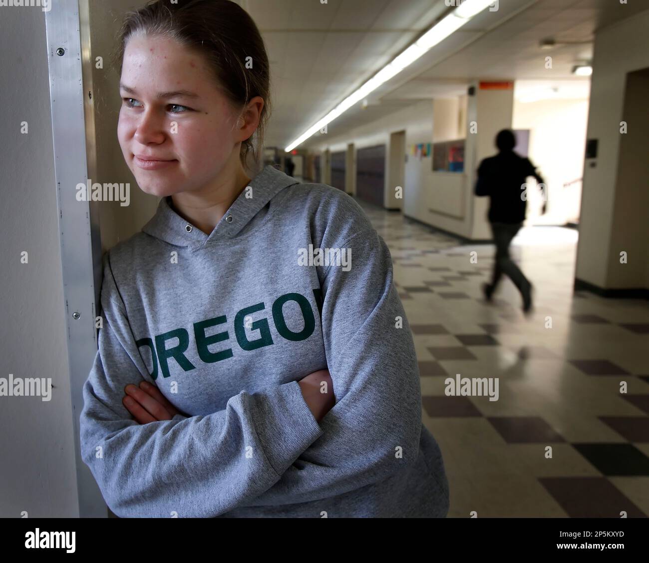 In this Feb. 8, 2013 photo, Hannah Larson poses in the hallway of the ...