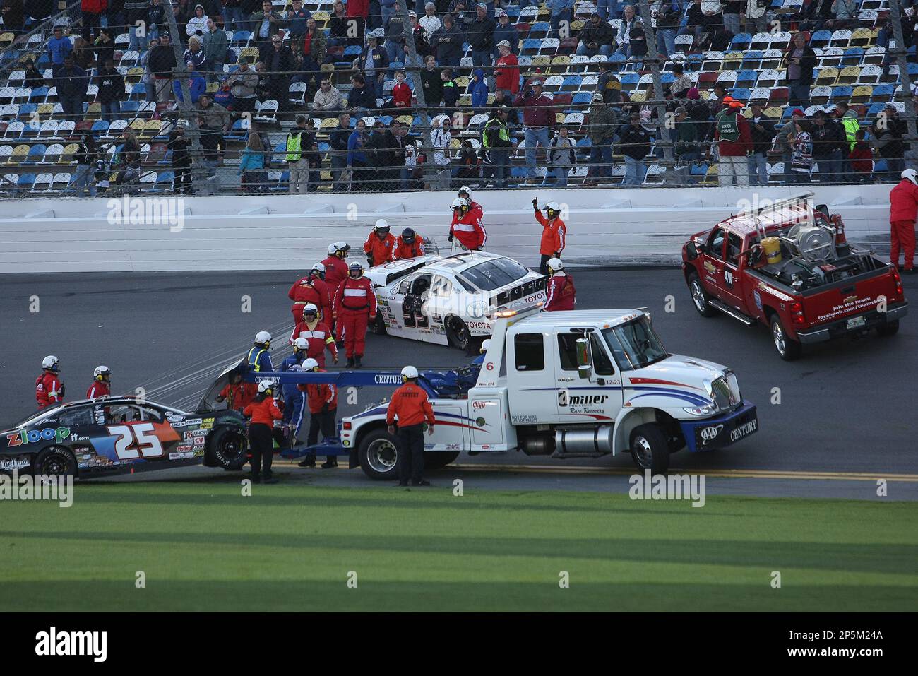 Race car driver Darrell Wallace (55) and Juston Boston (25) rest on the ...