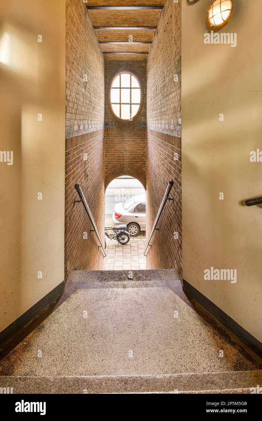 a motorcycle parked in an old brick building, taken from the inside and ...