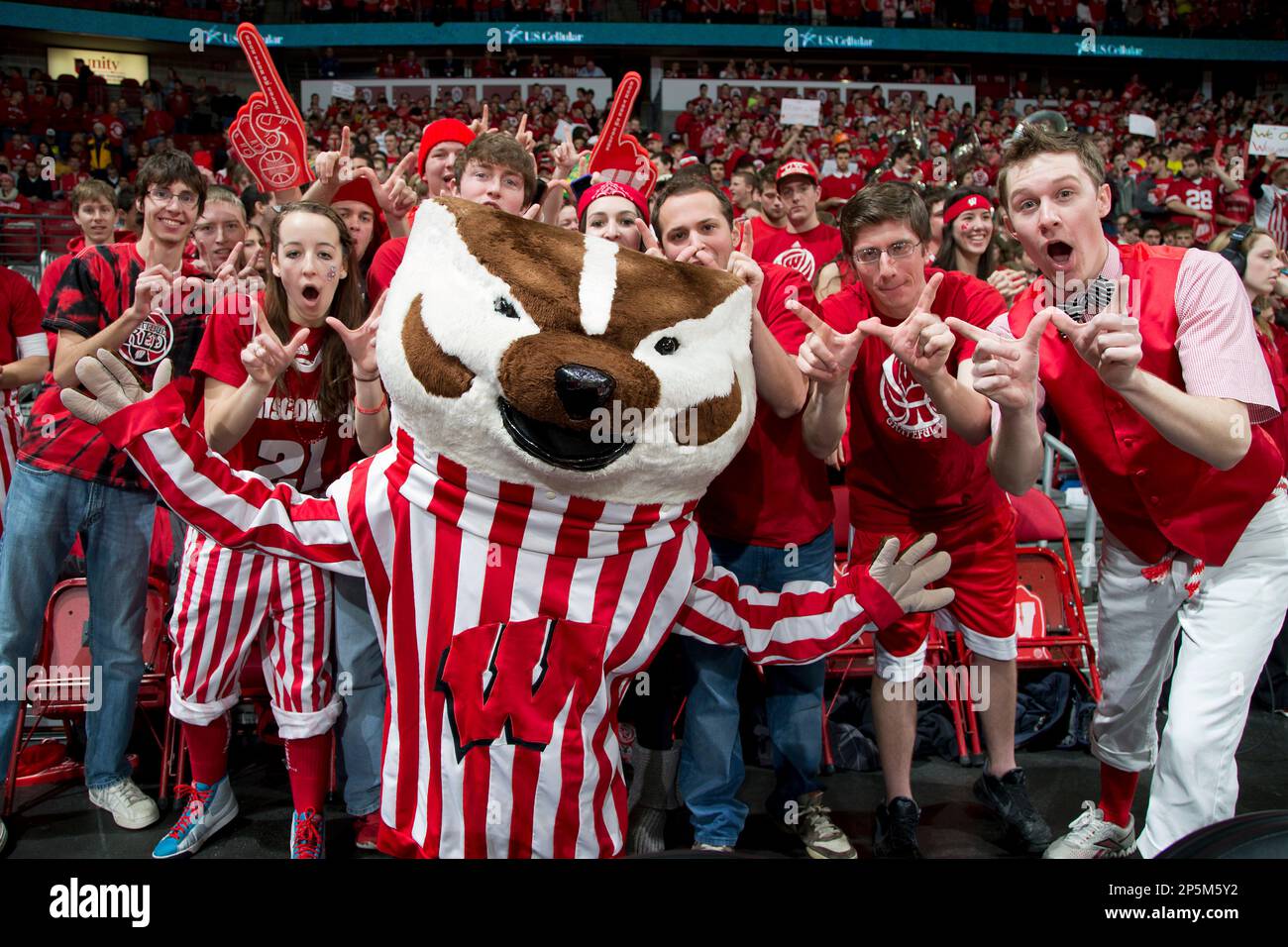 Wisconsin Badger fans pose with mascot Bucky Badger during a Big Ten ...