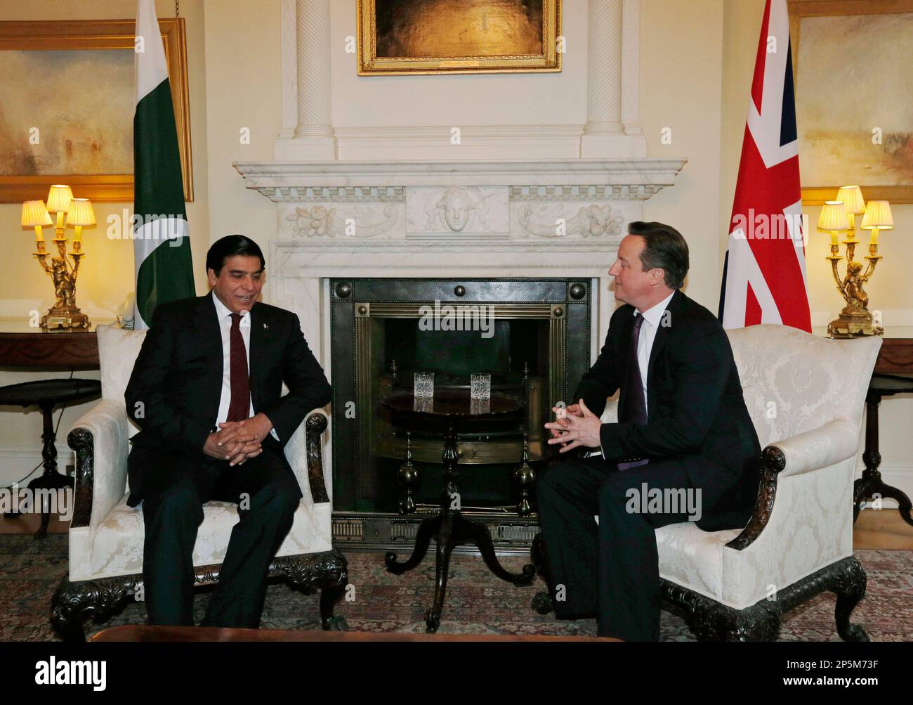 Britain's Prime Minister David Cameron, right, talks with Pakistan's ...