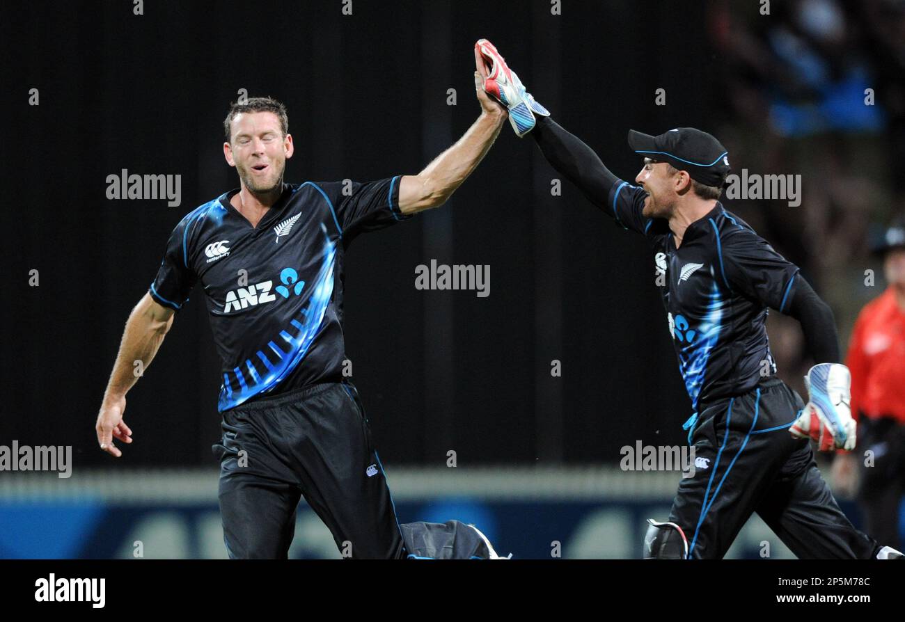 New Zealand's Ian Butler, left, celebrates with his captain Brendon ...