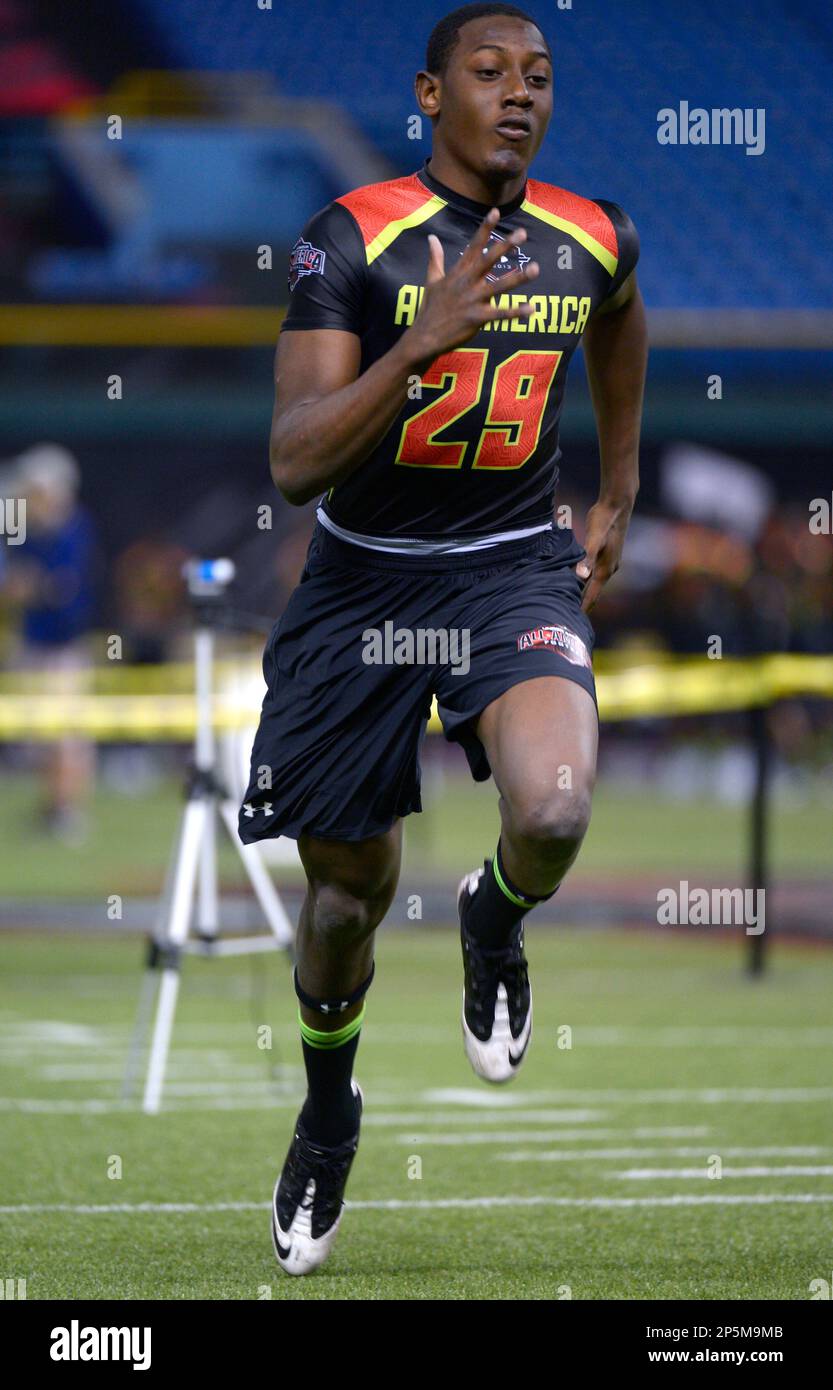 Alin Edouard (29), of Hialeah H.S. (FL), runs in a drill during the ...