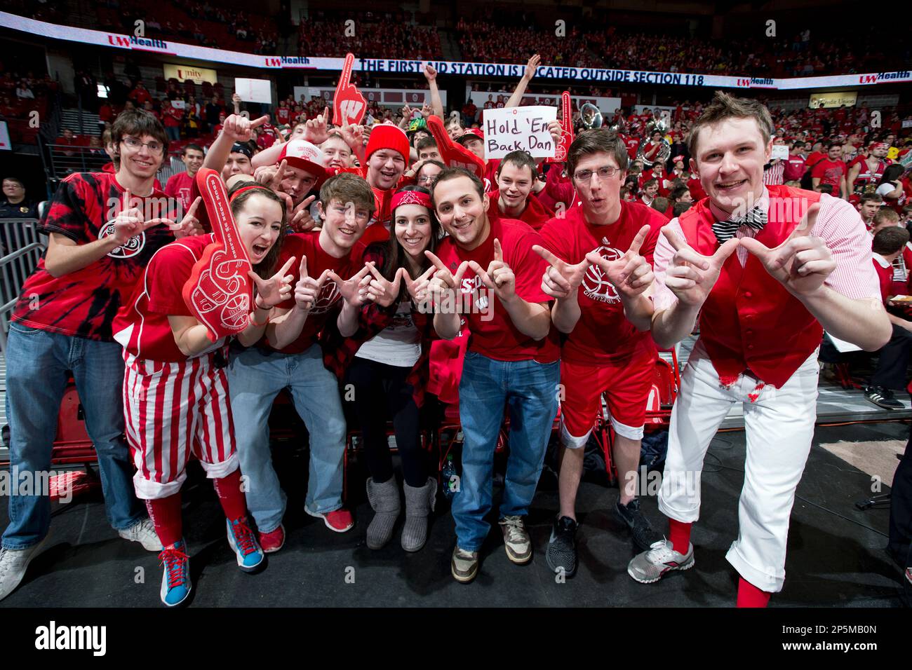 Wisconsin Badger fans pose for a photo during a Big Ten Conference NCAA ...