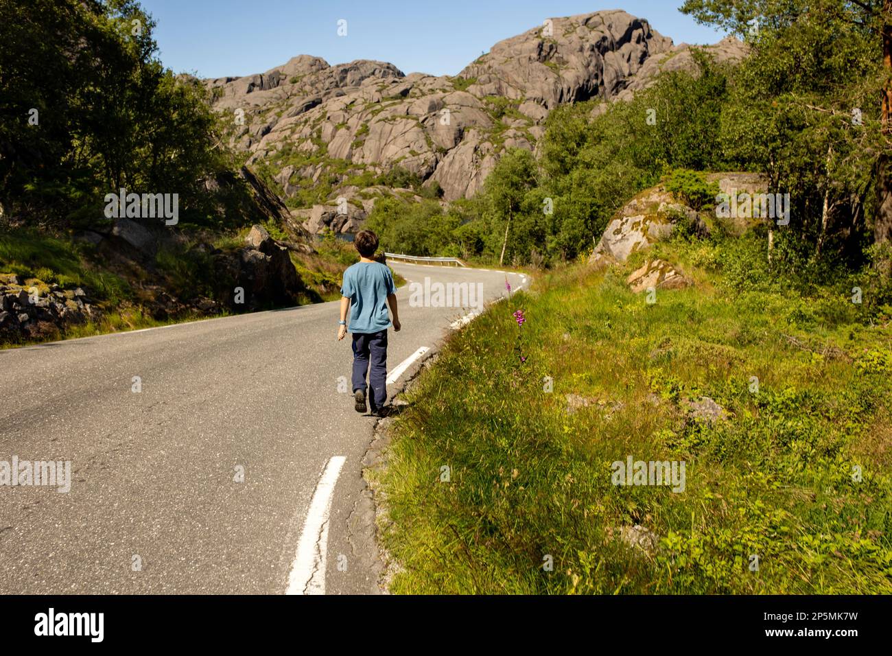 Happy people, enjoying amazing views in South Norway coastline, fjords ...