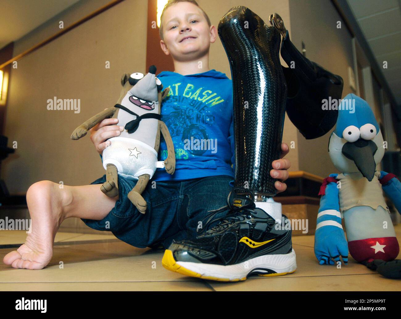 ADVANCE FOR MONDAY, FEB. 4 In this Jan. 22, 2013 photo Ethan Earl, 12 ...