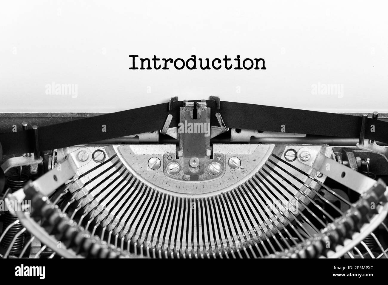 Introduction word closeup being typing and centered on a sheet of paper ...