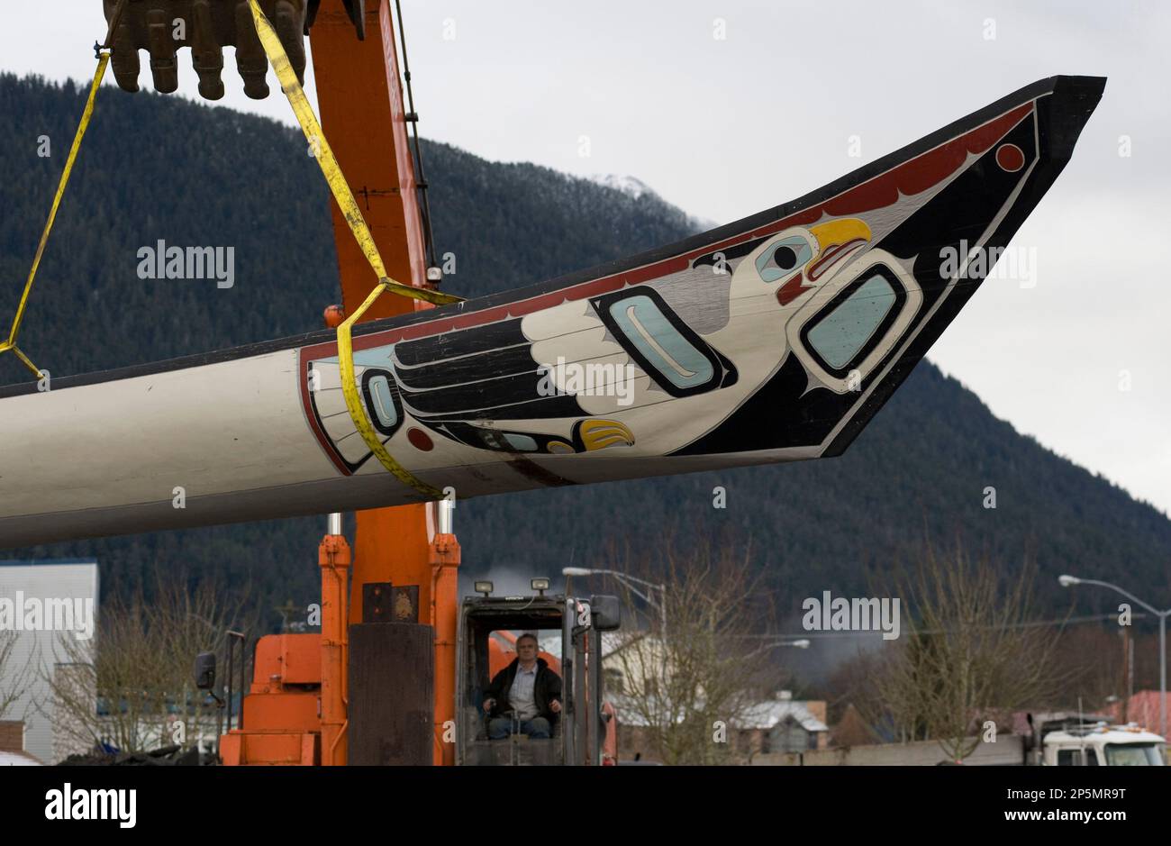 CBC construction worker Jim O’Brien uses an excavator to move the 50 ...