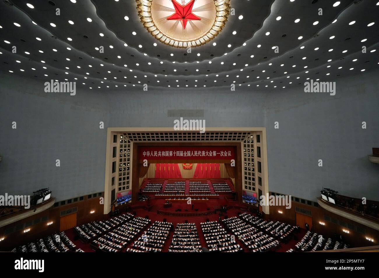 Delegates attend a session of China's National People's Congress (NPC ...