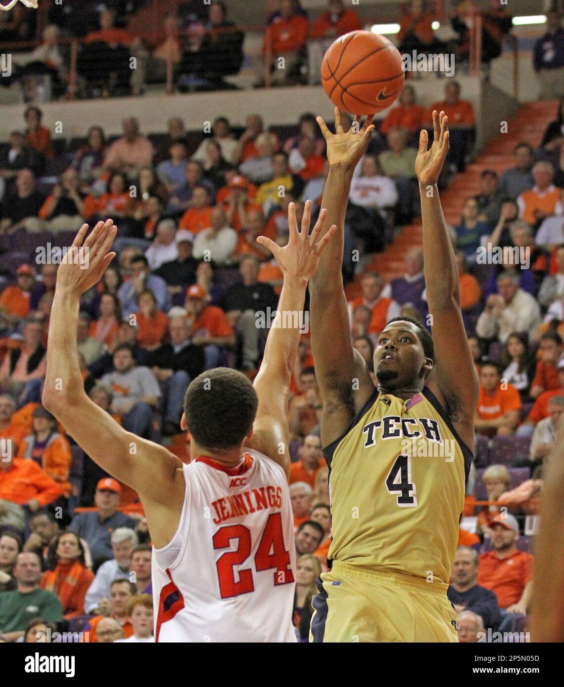 Georgia Tech's Robert Carter, Jr., right, shoots over Clemson's Milton ...