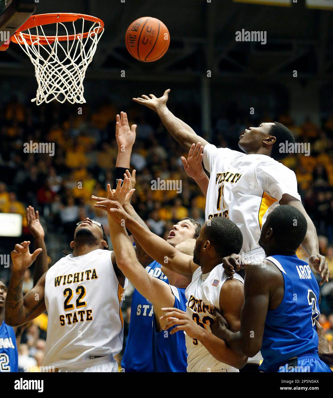 Wichita State's Cleantony Early (11) and Carl Hall (22) battle for a ...