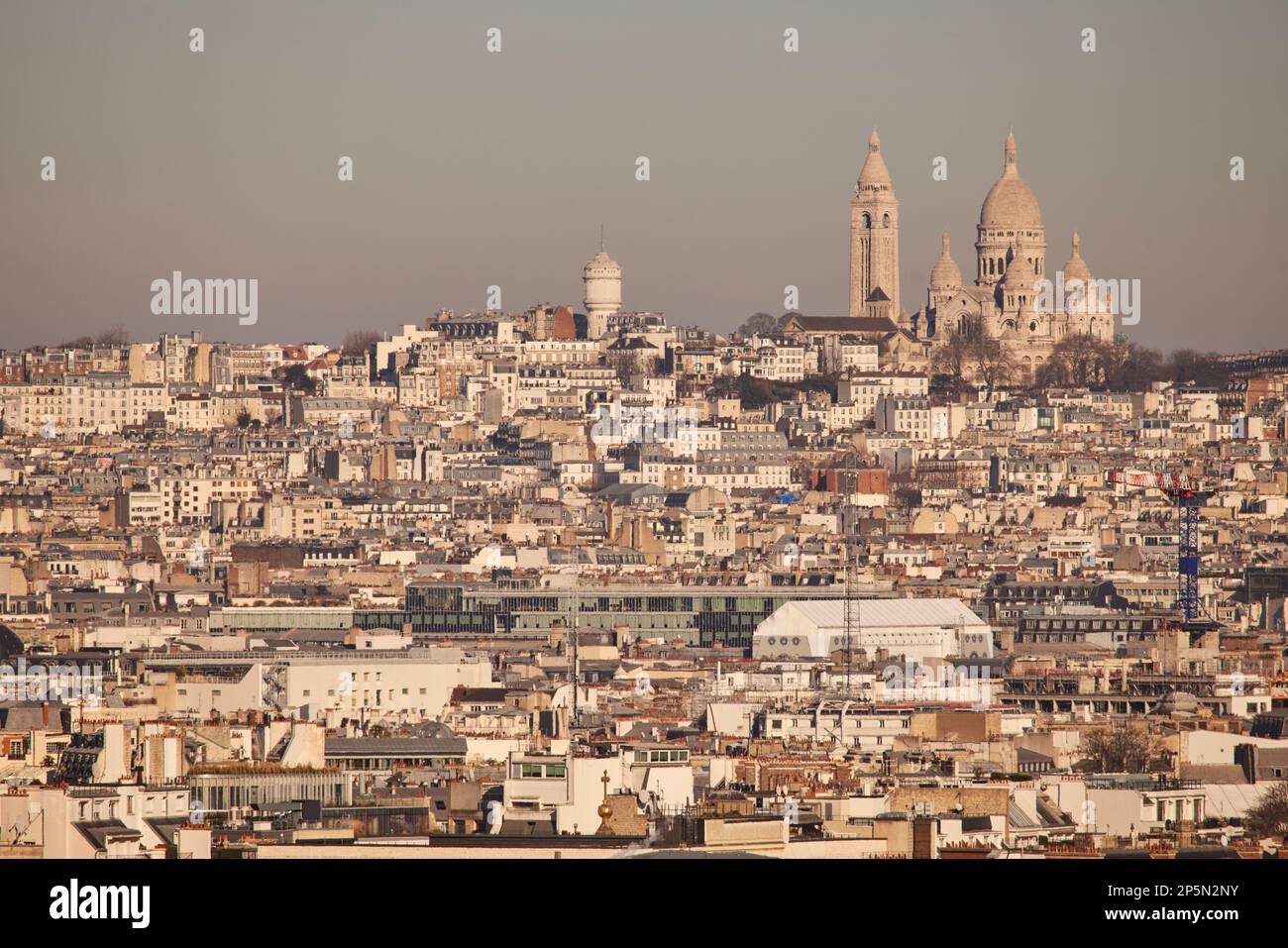 Paris landmark, rooftops on the skyline showing montmartre hill and ...
