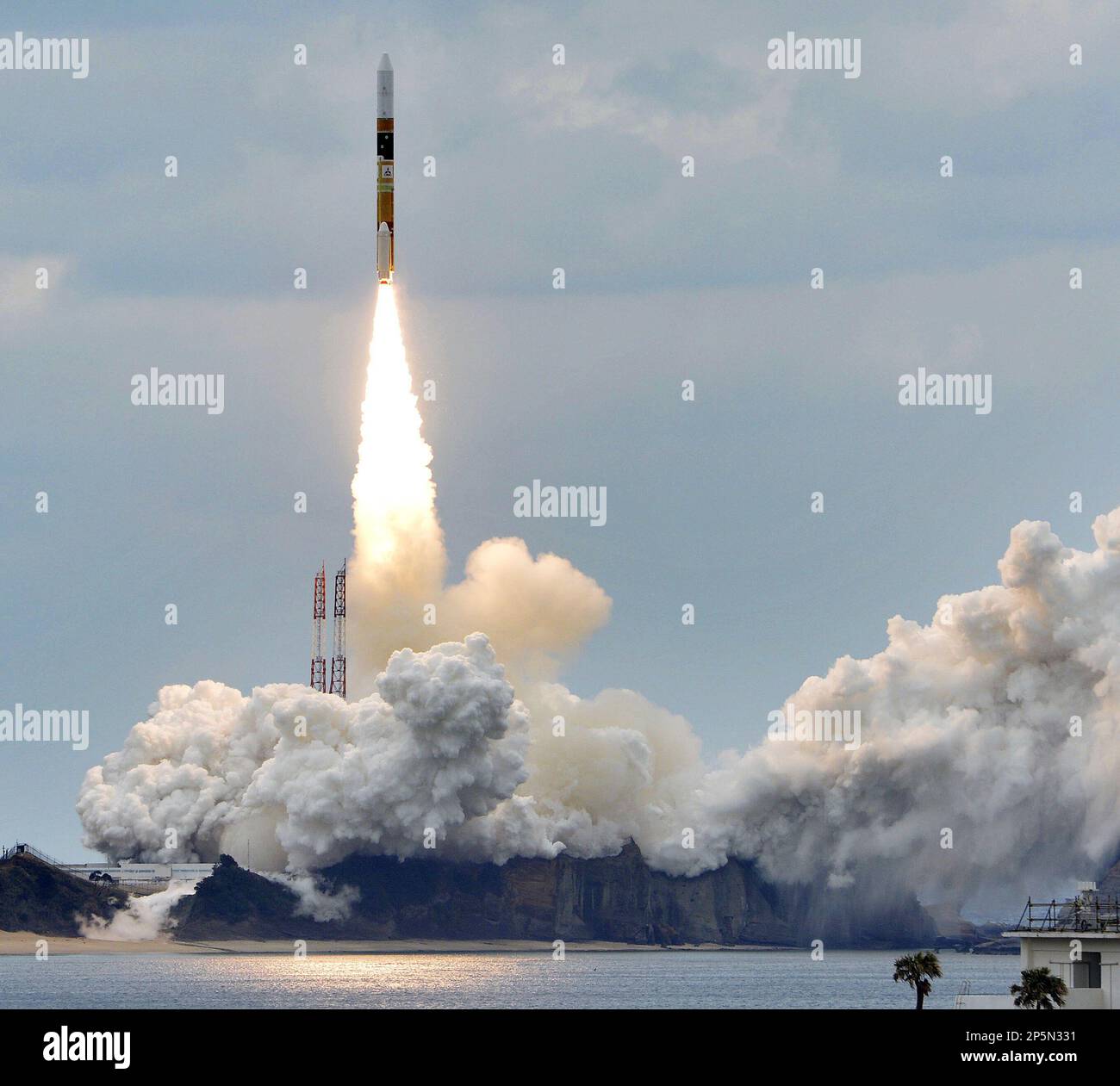 An H2-A rocket carrying two intelligence satellites lifts off from its ...