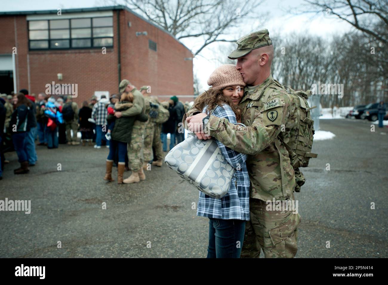 Josh Roddy kisses his wife Brittany shortly after arriving in Jackson ...