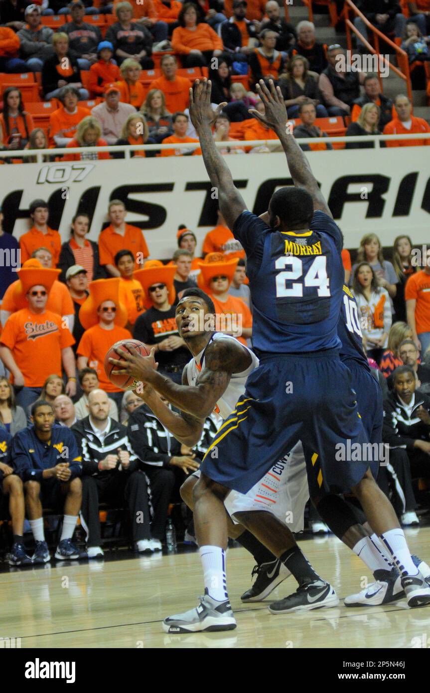 Oklahoma State forward Le'Bryan Nash attempts to get around West ...