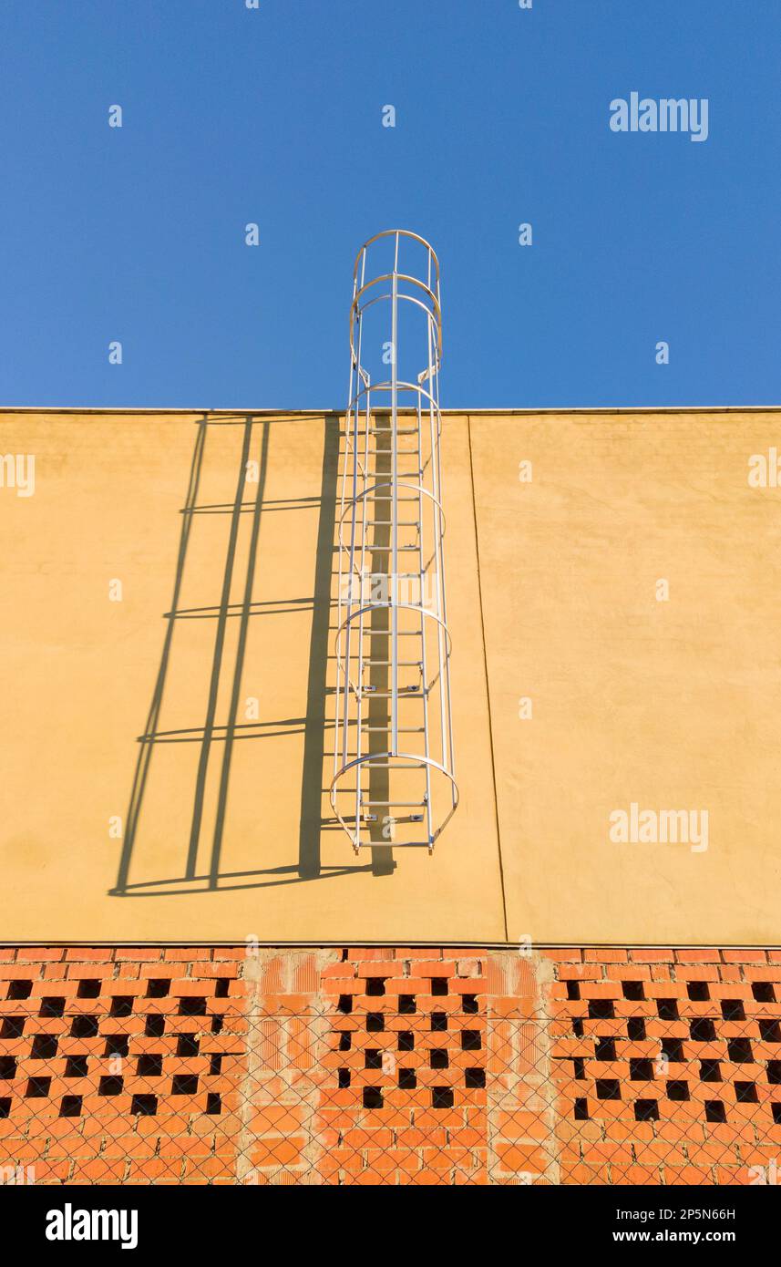 Service ladder installed on a commercial premises under construction ...