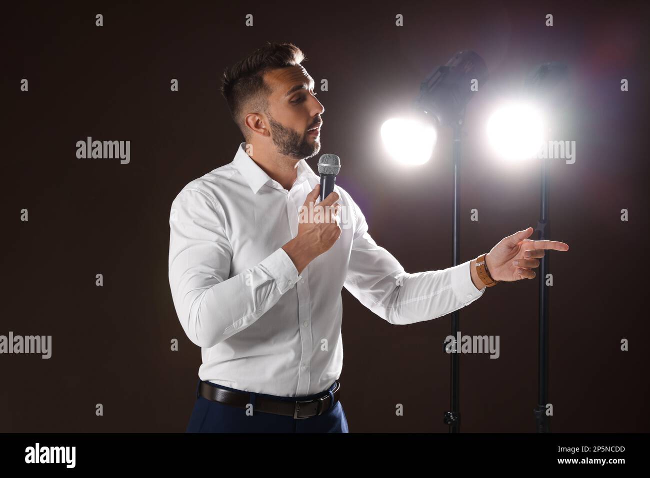 Motivational speaker microphone performing hi-res stock photography and ...