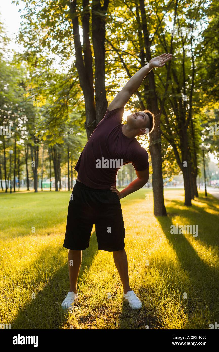 outdoor aerobics man training for good shape Stock Photo - Alamy