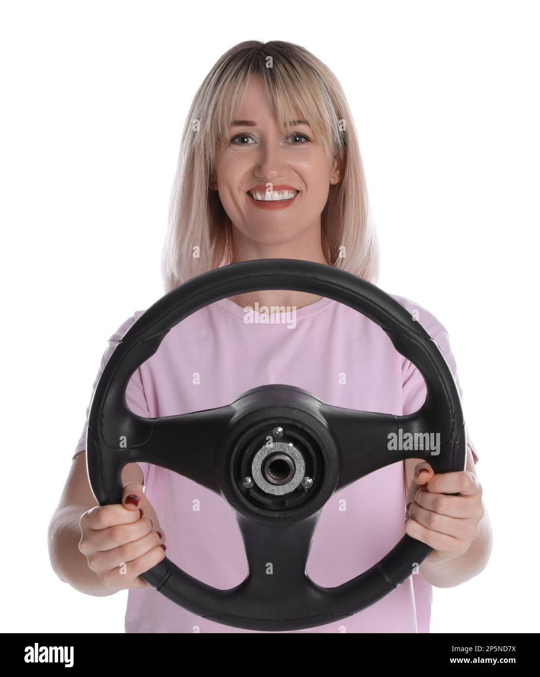 Happy woman with steering wheel on white background Stock Photo - Alamy