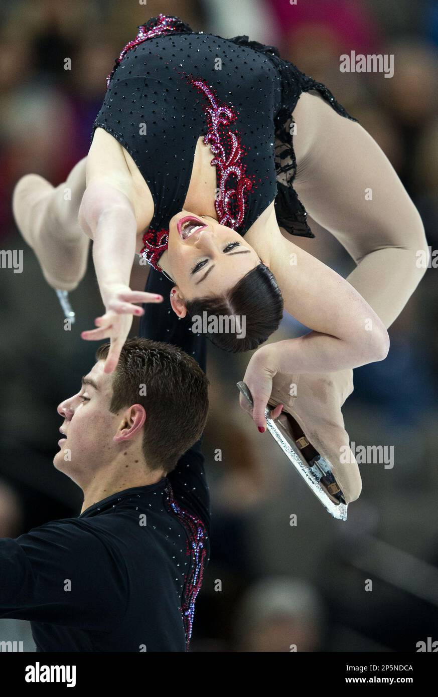Haven Denney, top, and Brandon Frazier compete during the short program ...
