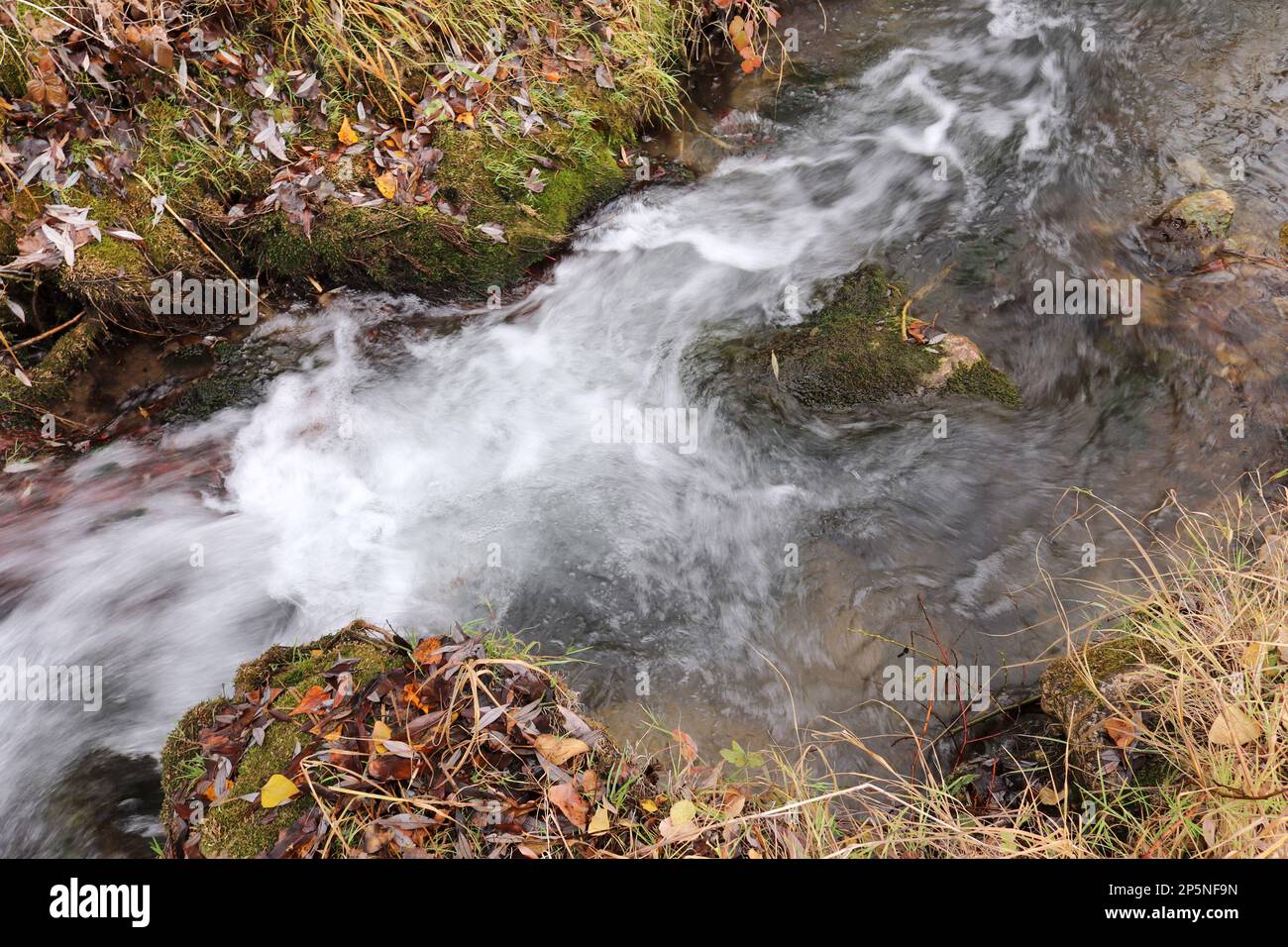 Narrow stream falling down mountain hi-res stock photography and images ...