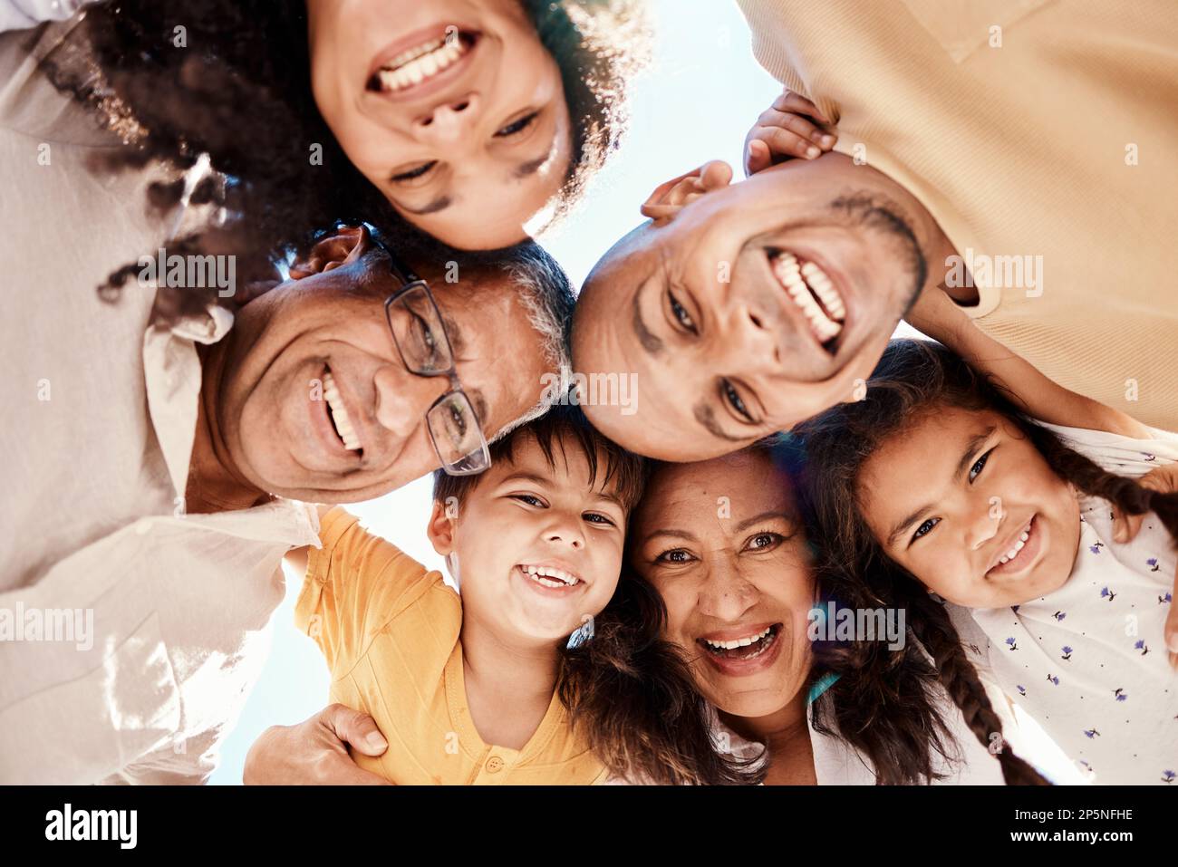Happy, huddle and portrait of a family in nature for bonding, fun and ...