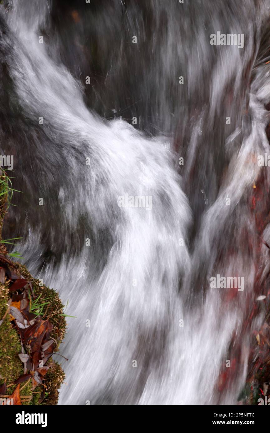 Narrow stream falling down mountain hi-res stock photography and images ...