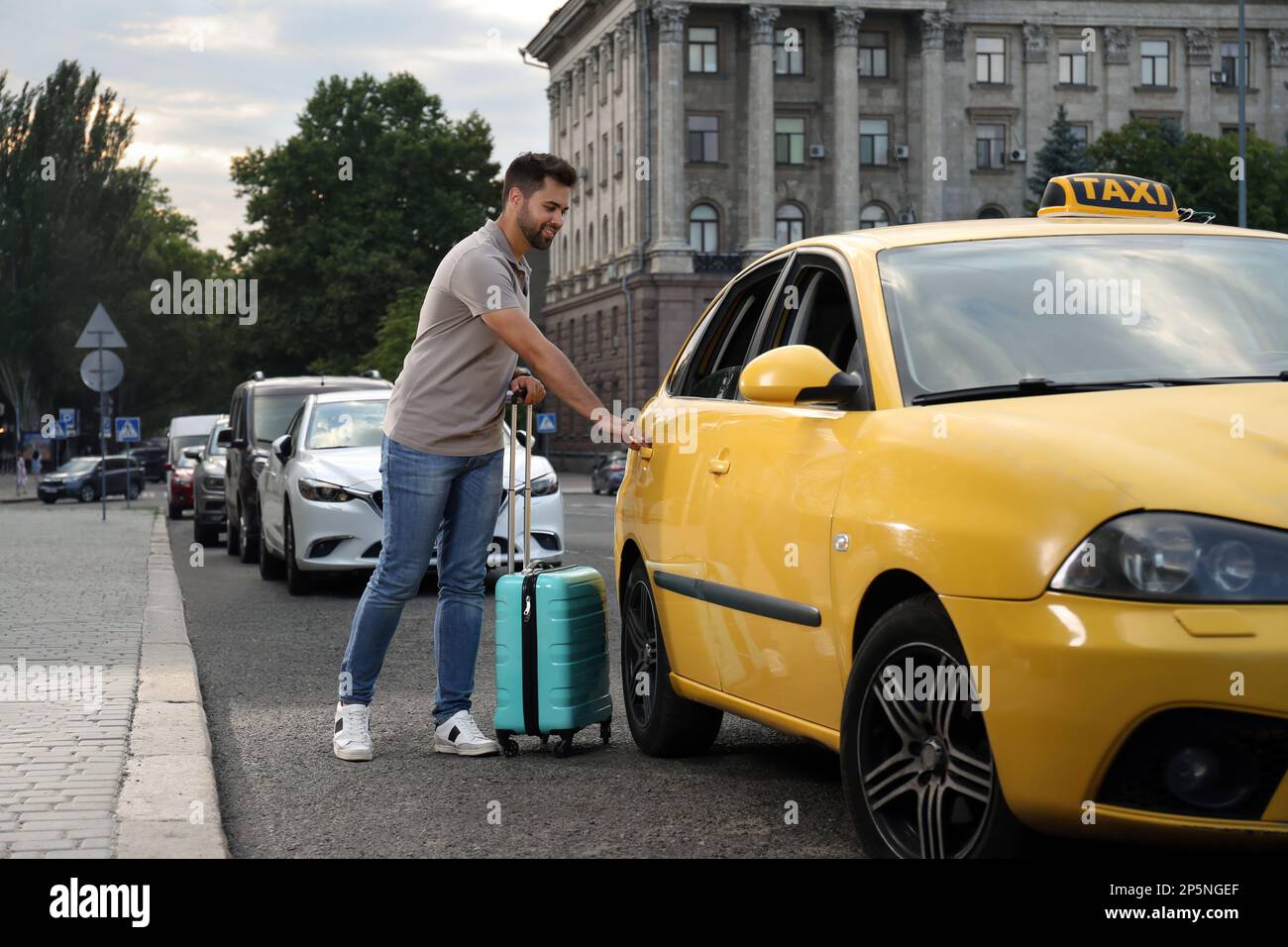 Young guy getting in car hi-res stock photography and images - Alamy