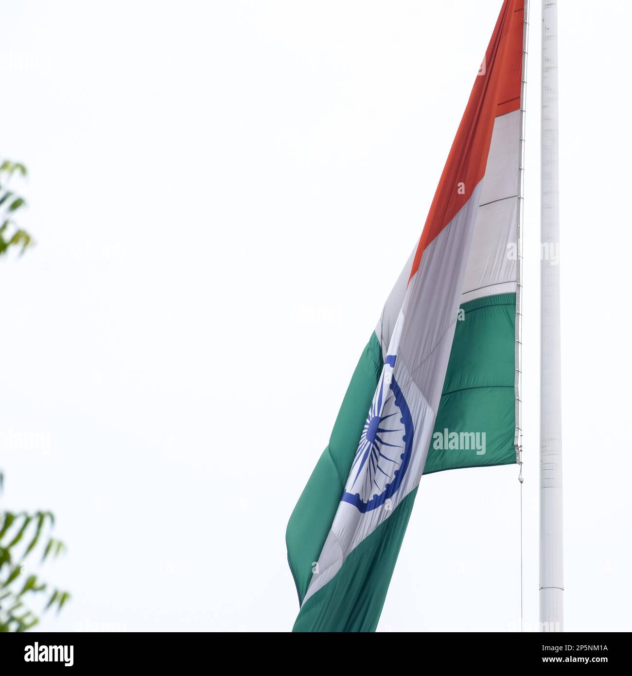 India flag flying high at Connaught Place with pride in blue sky, India ...