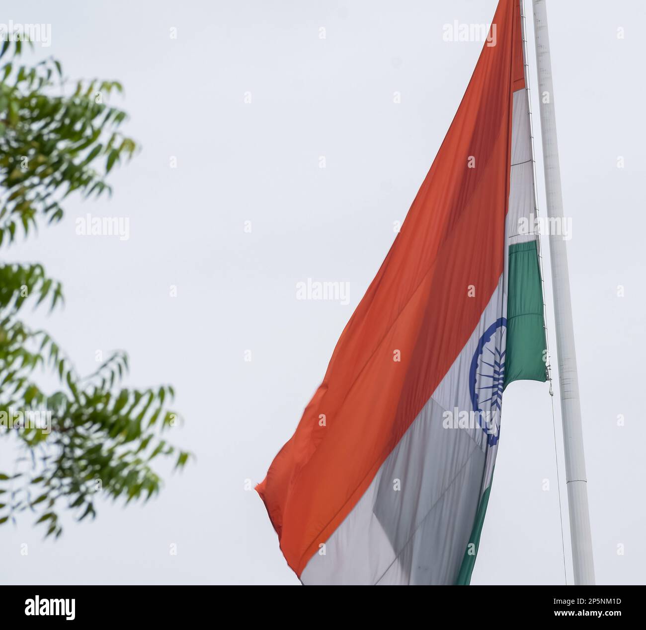 India flag flying high at Connaught Place with pride in blue sky, India ...