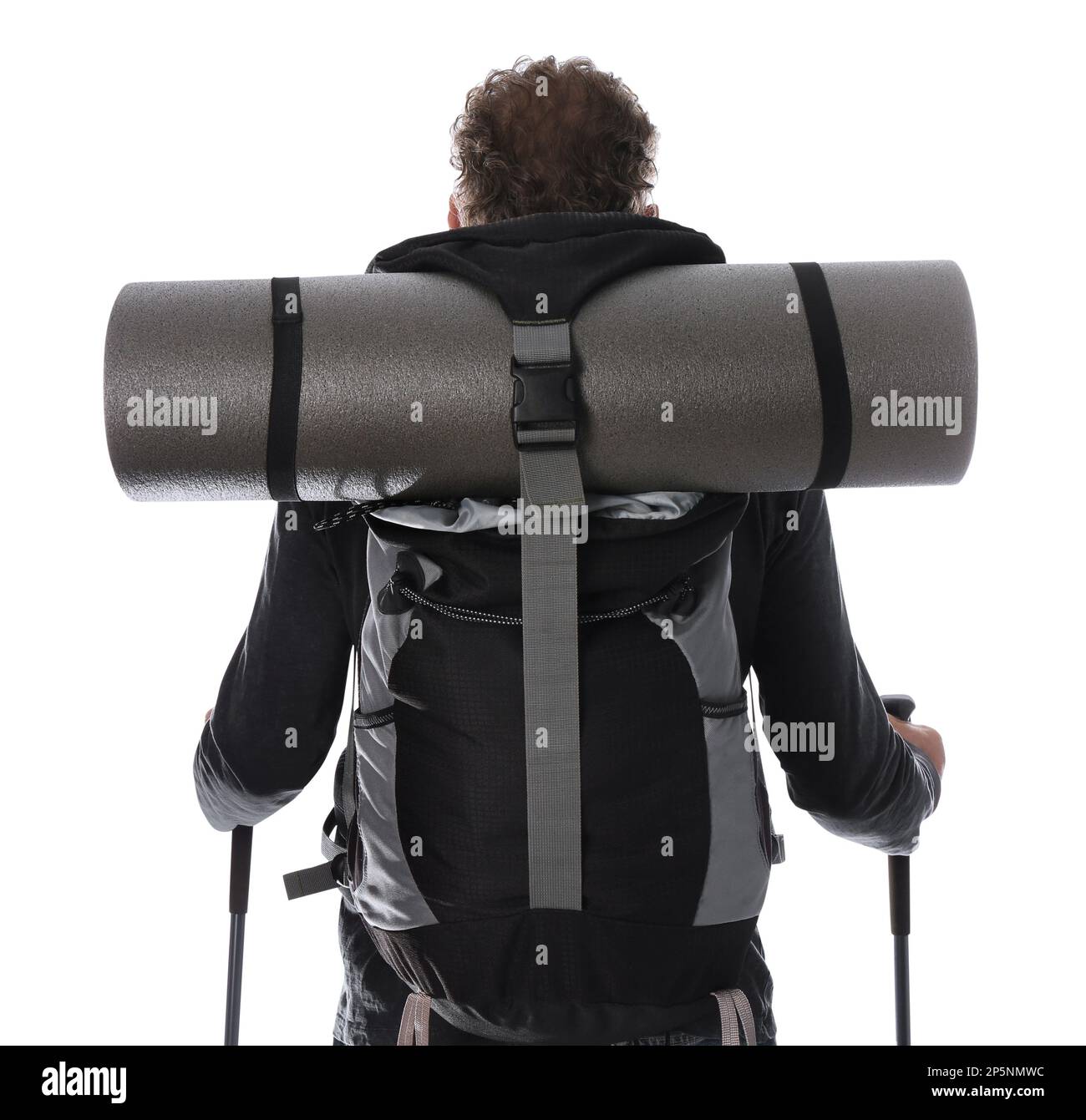 Male hiker with backpack and trekking poles on white background, back ...