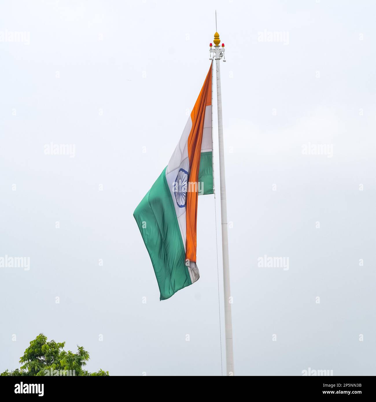 India flag flying high at Connaught Place with pride in blue sky, India ...
