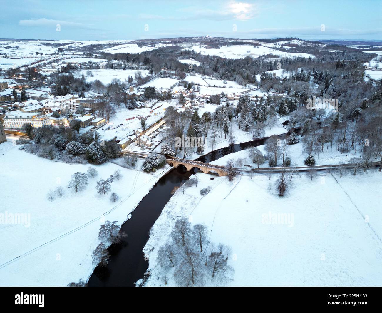 Snow covered fields surround Alnwick Castle in Northumberland as ...
