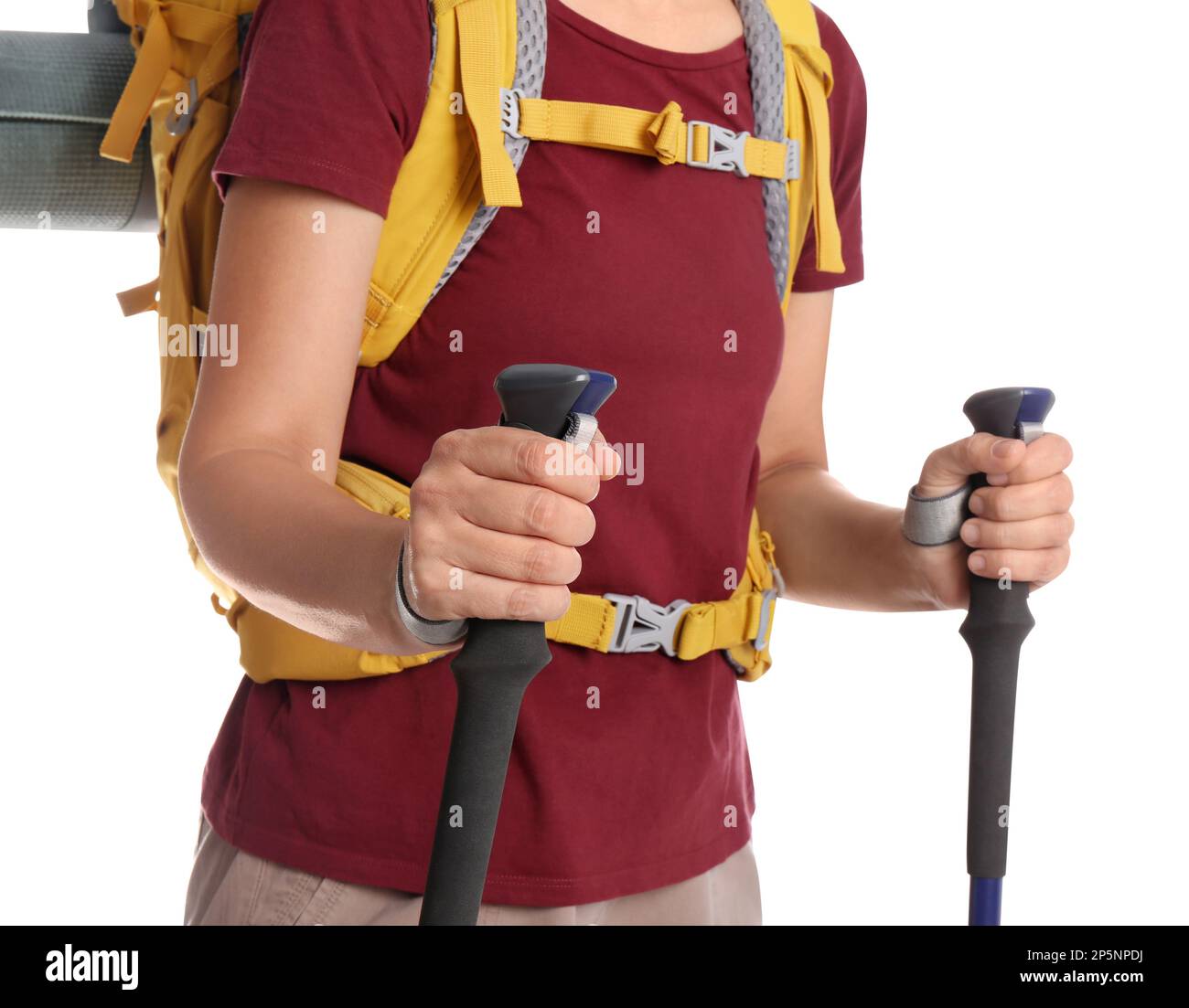 Female hiker with backpack and trekking poles on white background ...