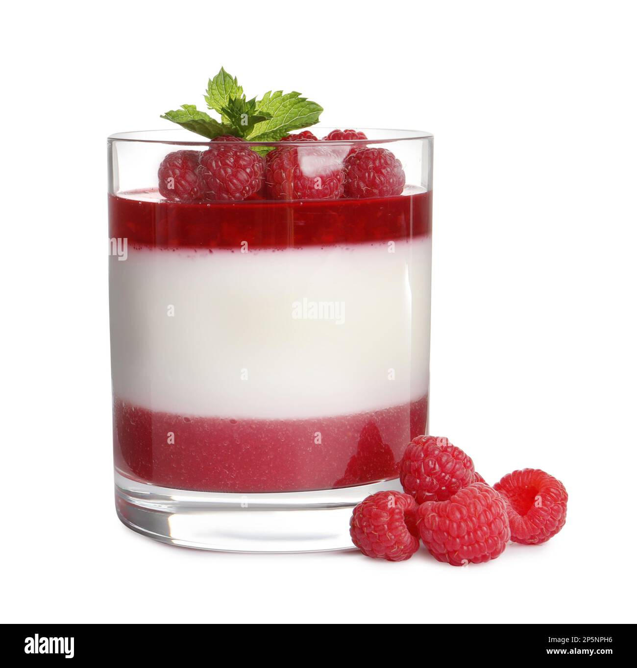Delicious panna cotta with fruit coulis and fresh raspberries isolated ...