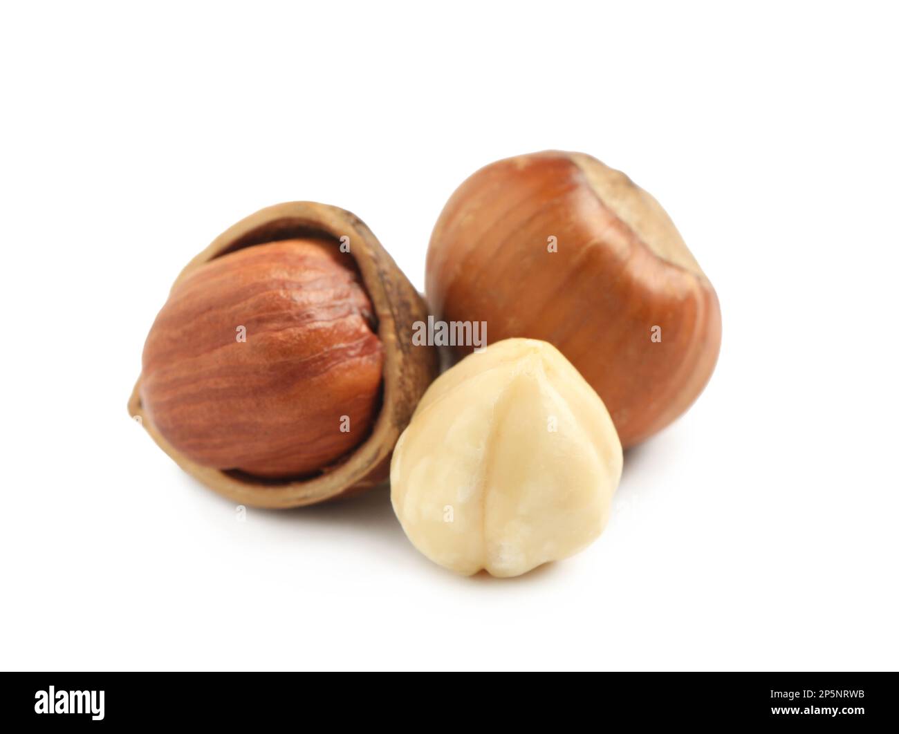 Tasty organic hazelnuts on white background. Healthy snack Stock Photo ...