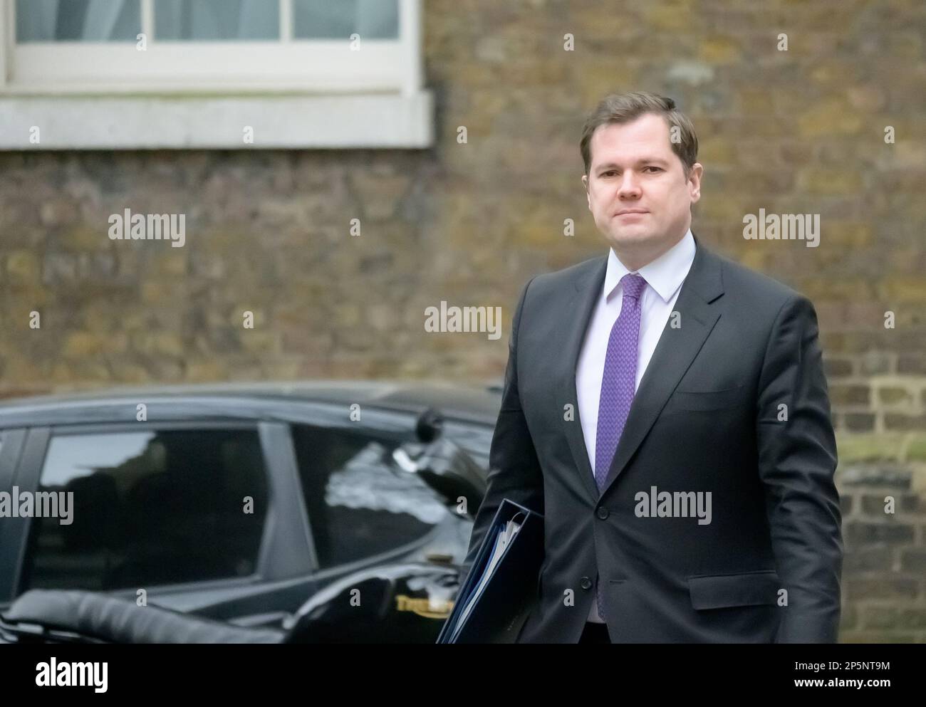 Robert Jenrick MP (Minister for Immigration) arriving in Downing Street ...