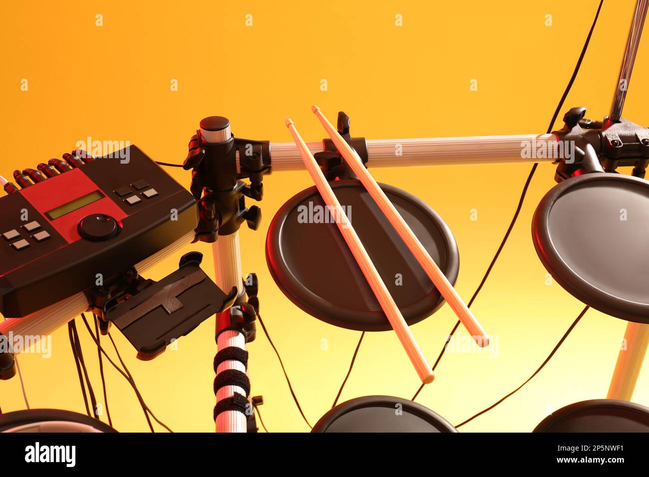 Modern electronic drum kit on yellow background. Musical instrument ...