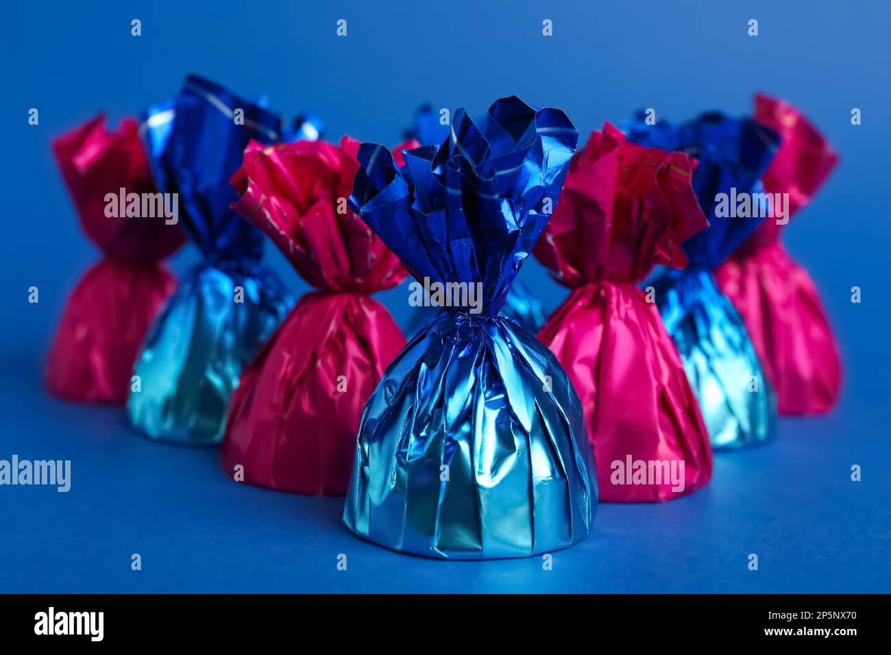 Candy in wrappers blue hi-res stock photography and images - Alamy