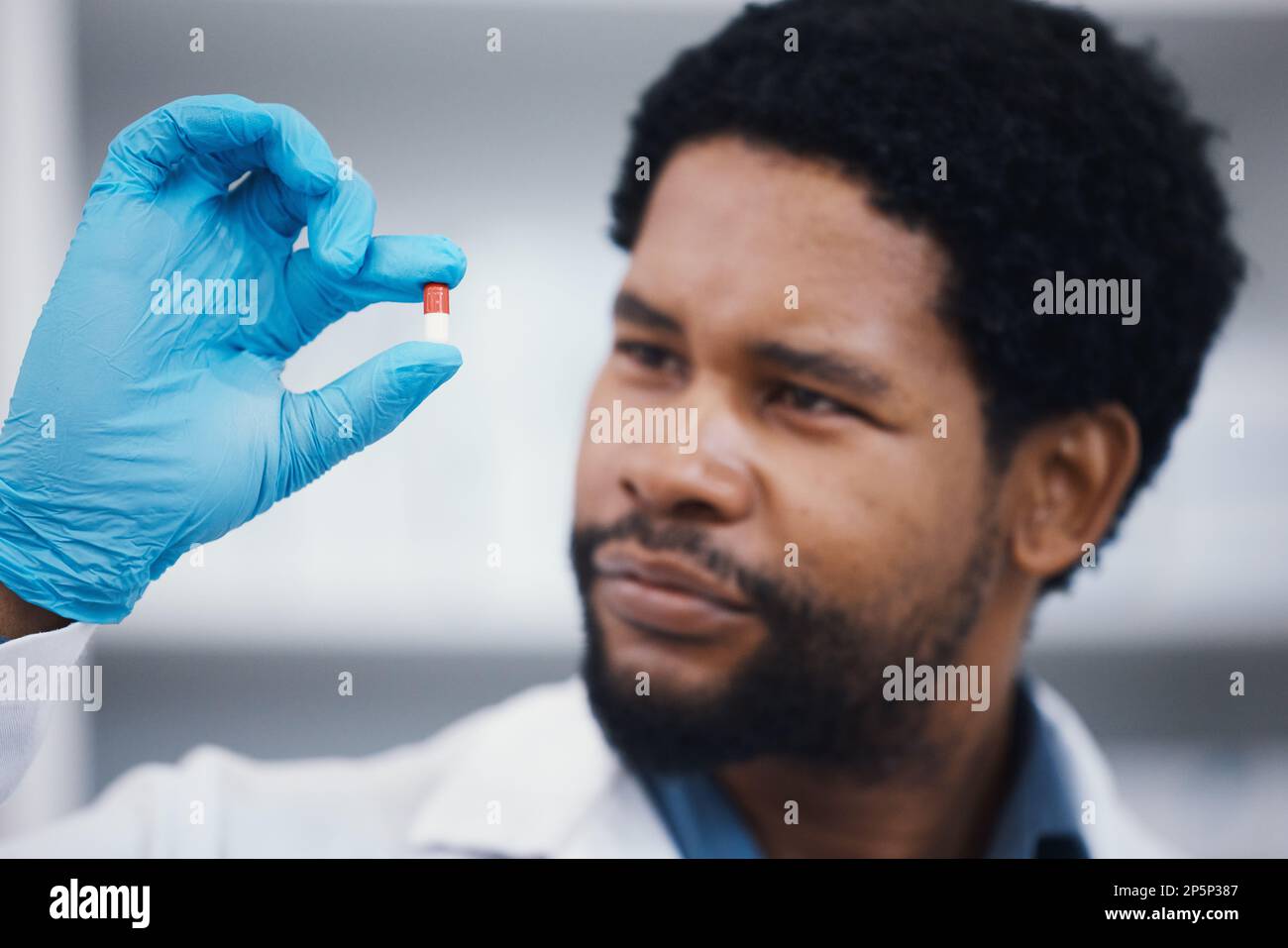 Black man, pharmacist or holding medicine in research, medical ...