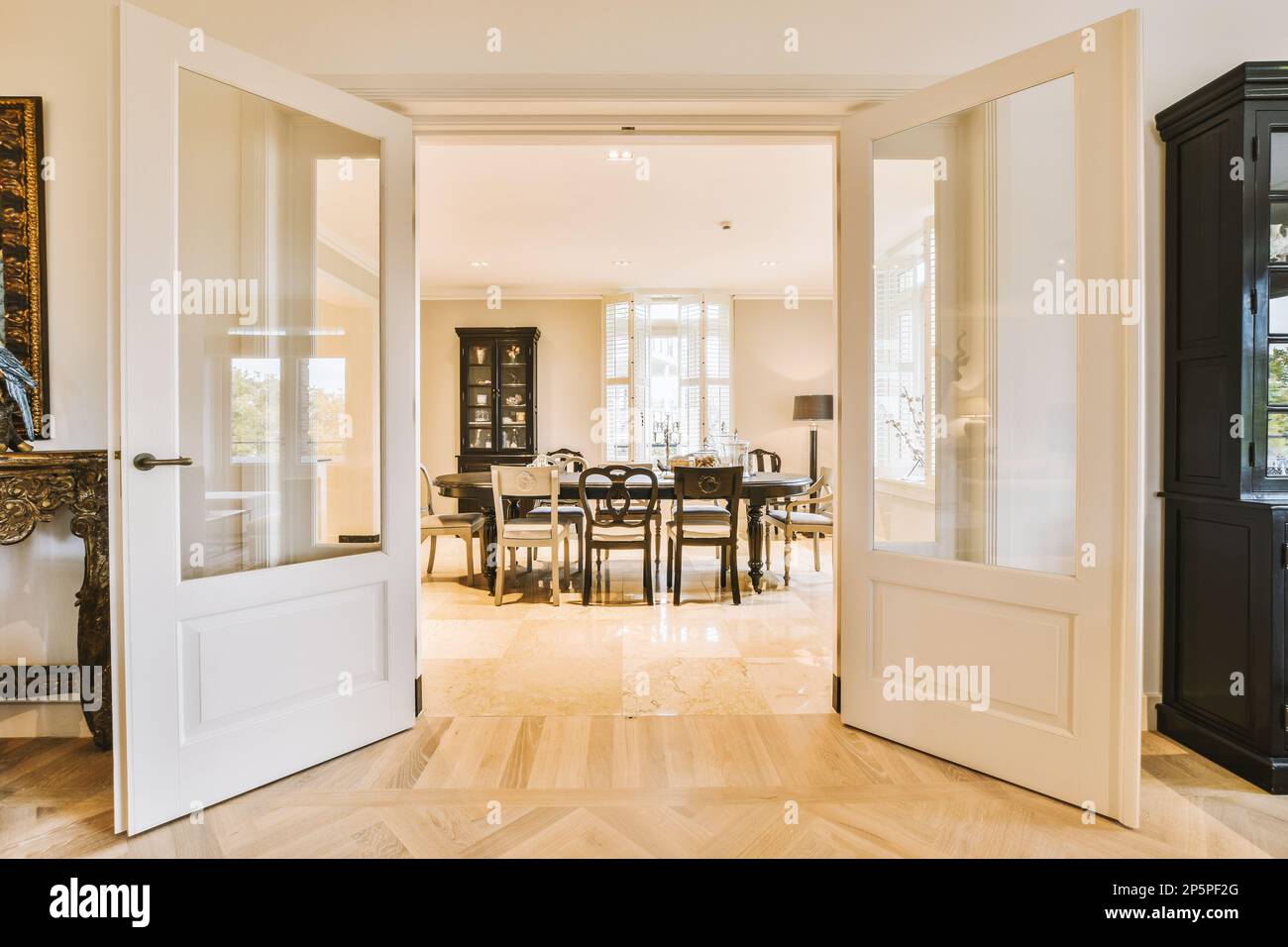 Wooden Doors Between Living Room And Dining Room