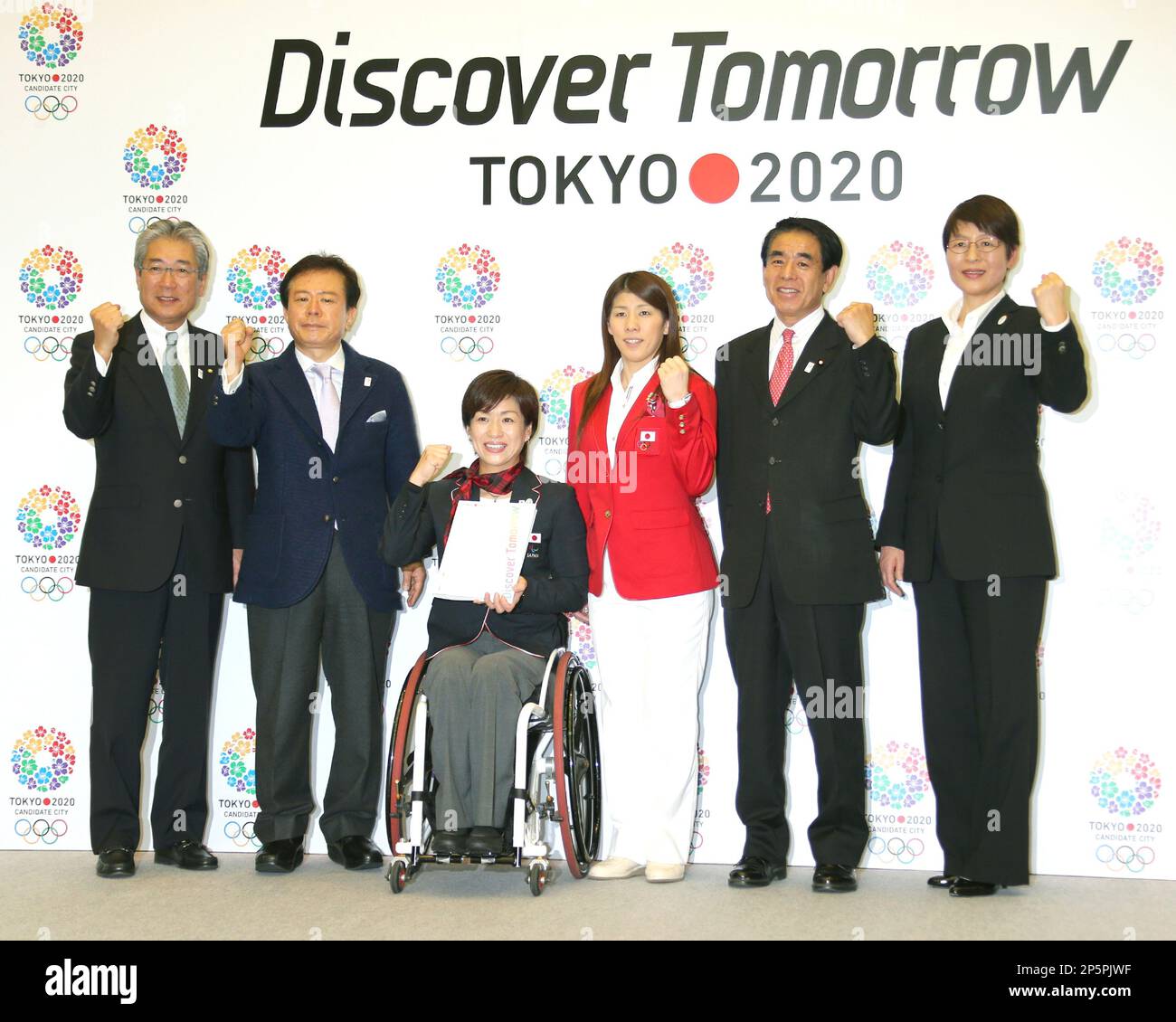 Members of the Tokyo 2020 Bid Commitee pose after a press conference to ...