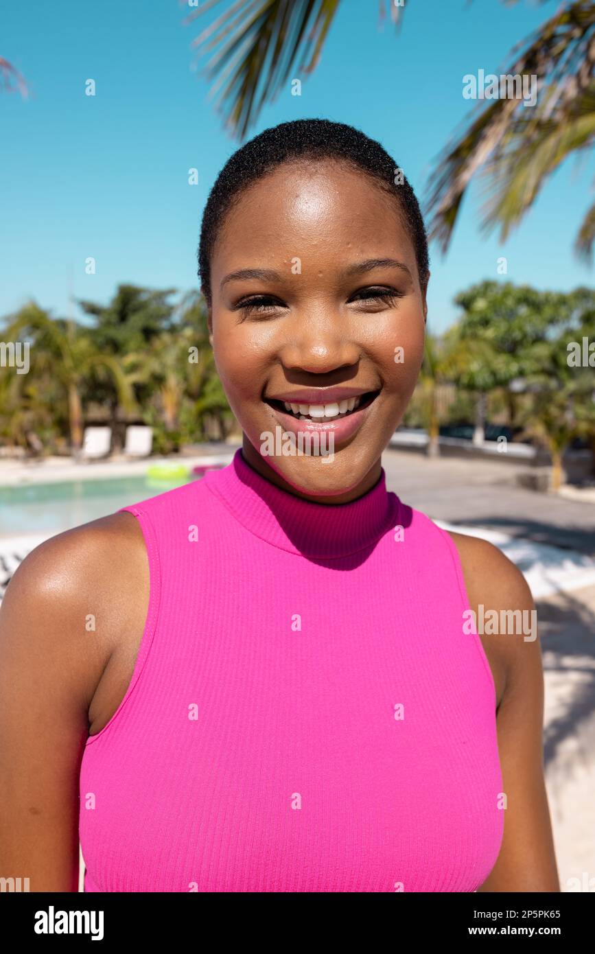 Portrait of happy african american woman looking at camera and smiling ...
