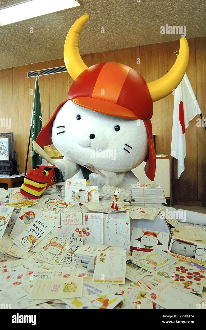 Hikonyan, a yuruchara mascot of Hikone city, Shiga Prefecture, is happy ...