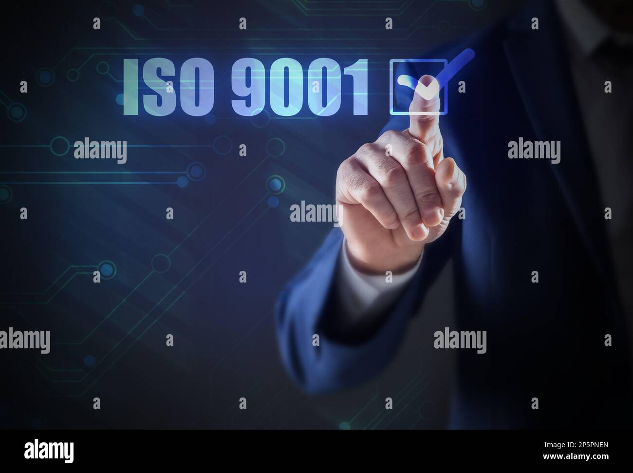 Man pointing at virtual screen with text ISO 9001, closeup Stock Photo ...