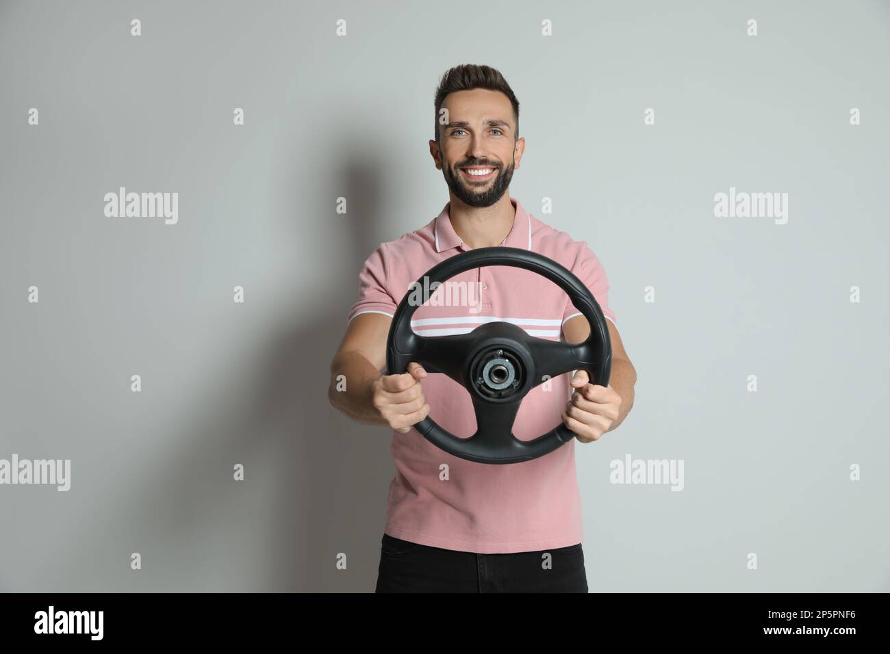 Man steering wheel pretend hi-res stock photography and images - Alamy