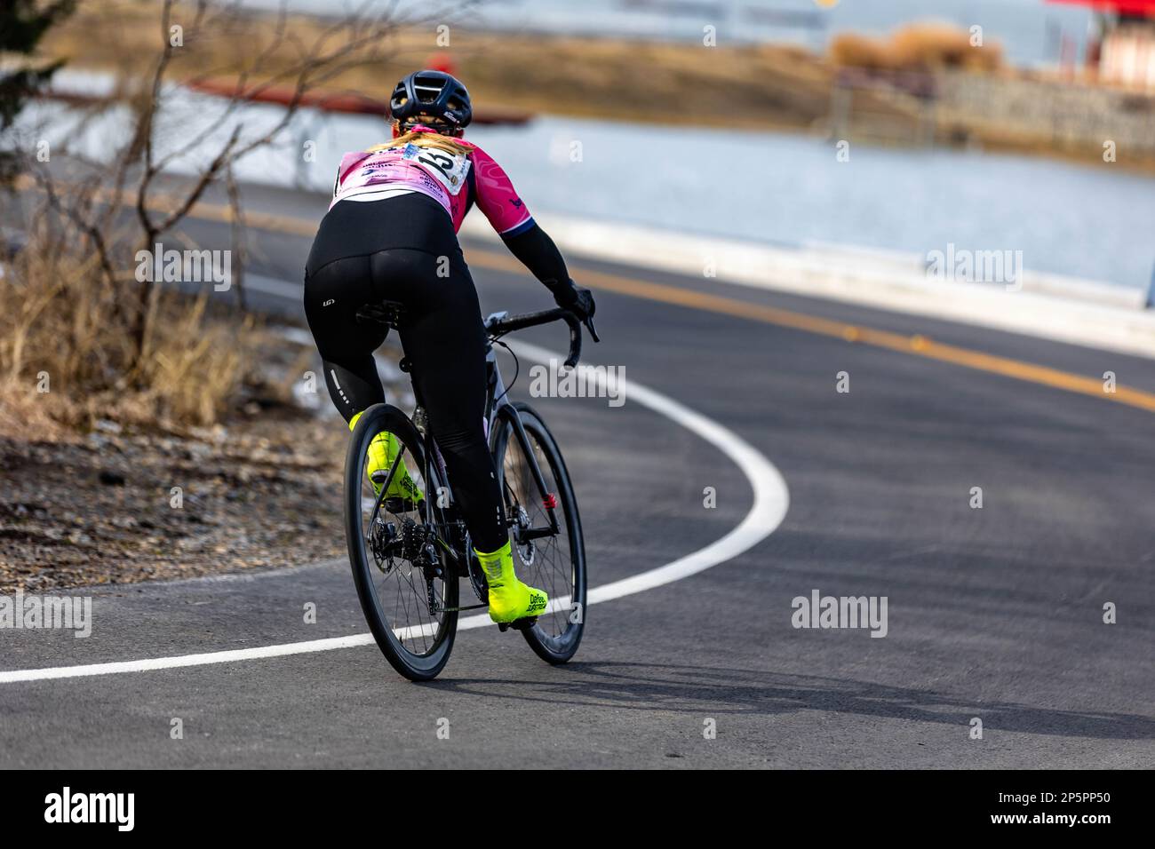 A female cyclist in a bright pink cycling jersey during the Cedar Hill ...